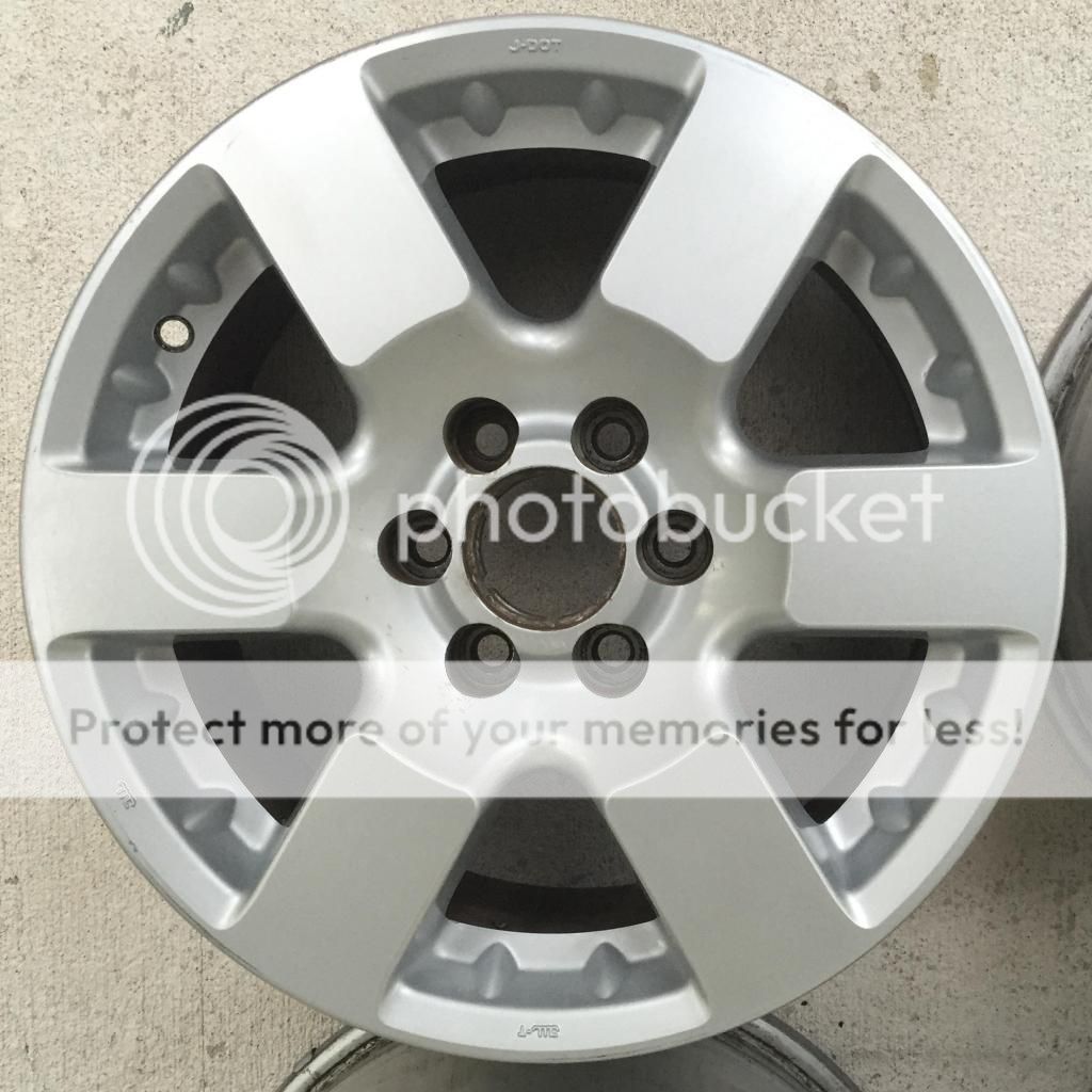 FS: Set of 4 OEM 16" Nismo Rims w/ Center Caps | Nissan Frontier Forum